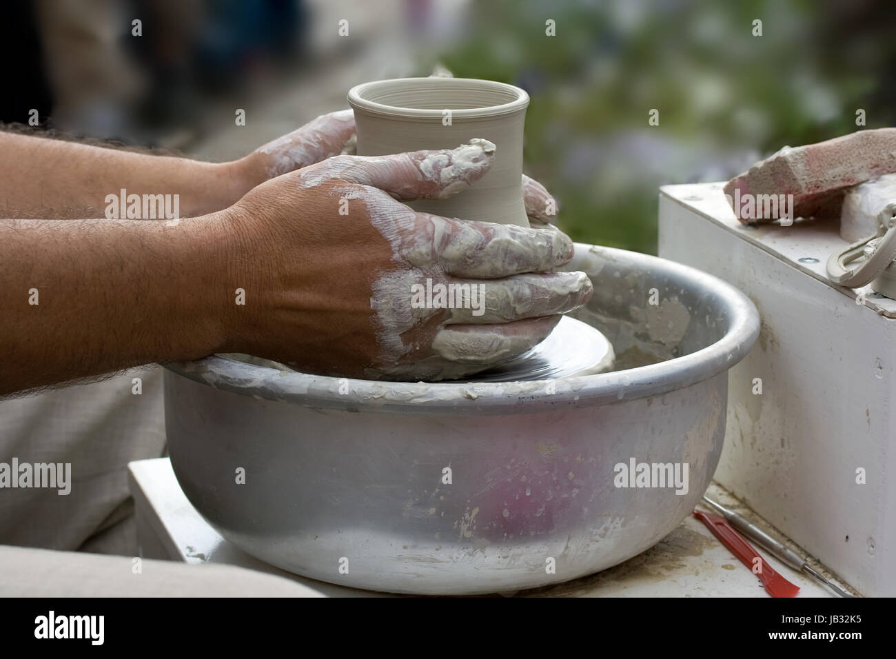 Masters hands making a pot Stock Photo - Alamy