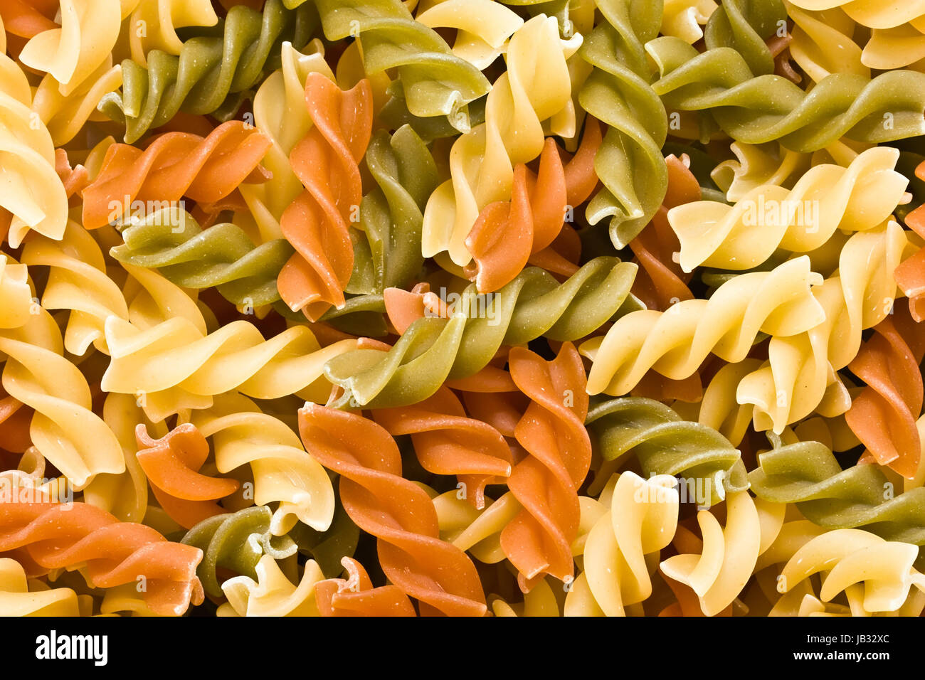 Raw italian pasta isolated on white background Stock Photo - Alamy