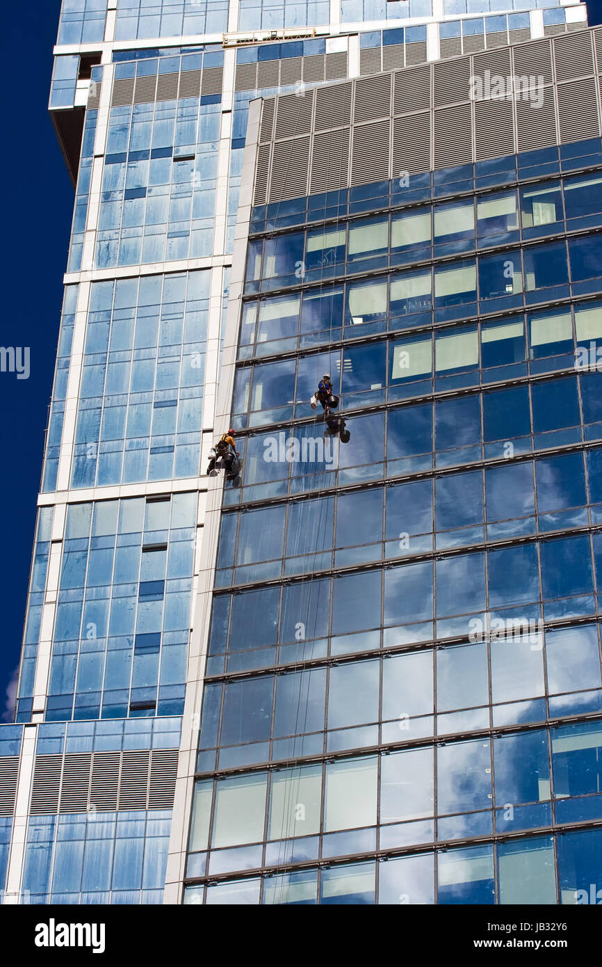 Cleaning windows skyscraper woman hi-res stock photography and images ...