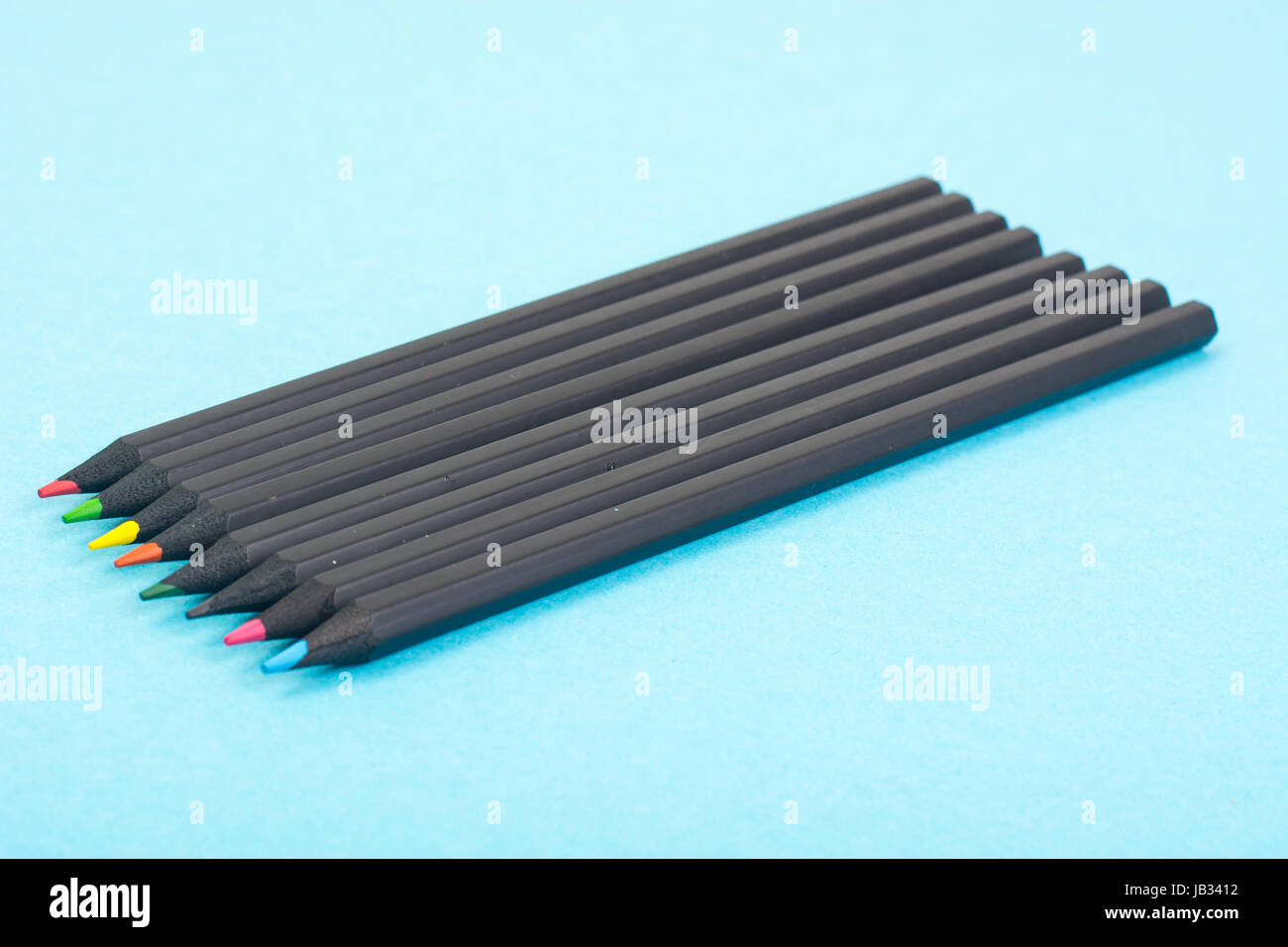 Set of black colored pencils on white background. Studio Photo Stock ...