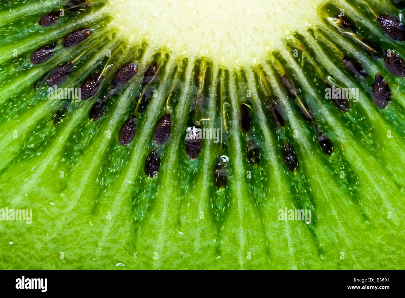 Macro photo of a fresh kiwi Stock Photo - Alamy