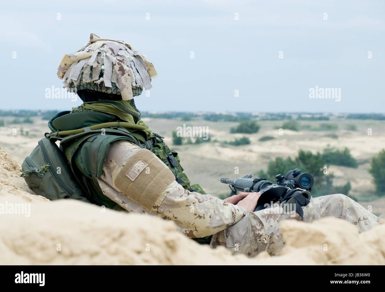 soldier in desert uniform at rest Stock Photo - Alamy