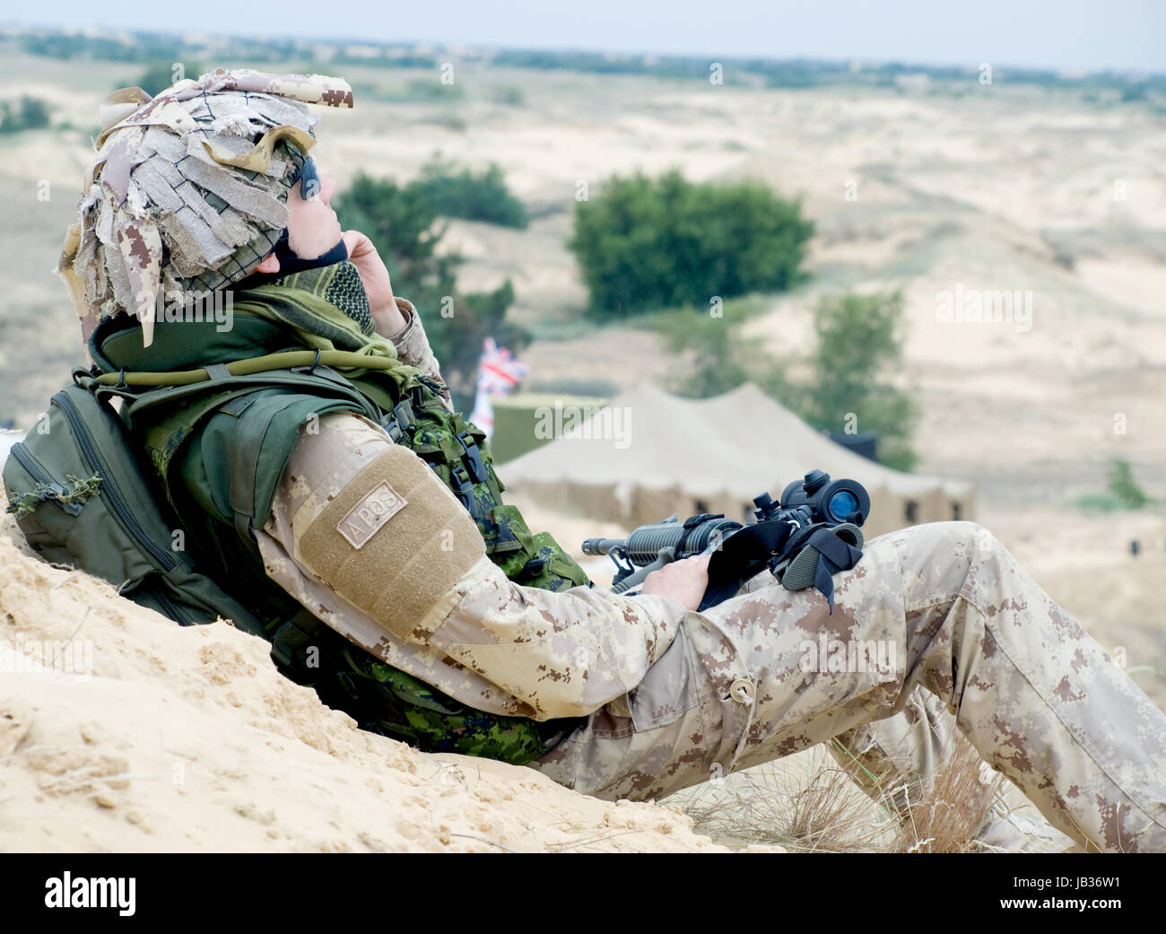 soldier in desert uniform at rest Stock Photo - Alamy