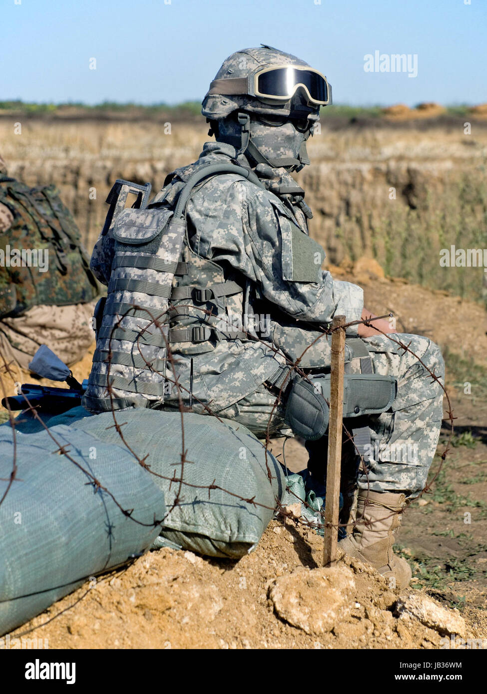 us soldier with assault rifle at the checkpoint Stock Photo - Alamy