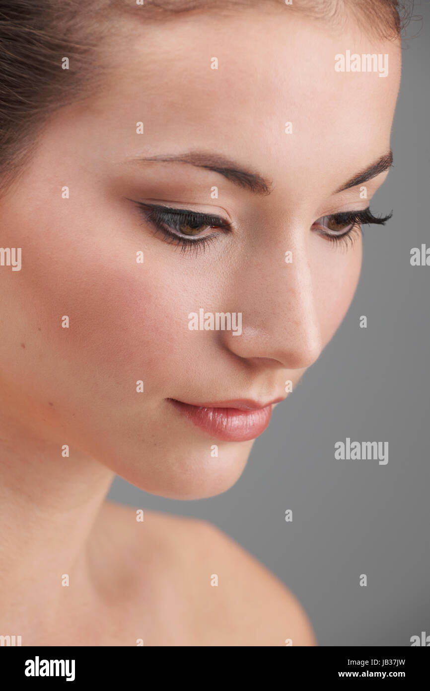 Young womans face with subtle make up and eye lash extensions Stock ...