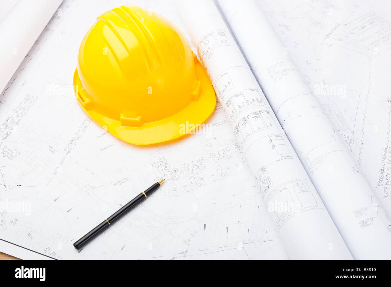 Blue print and safety helmet Stock Photo - Alamy