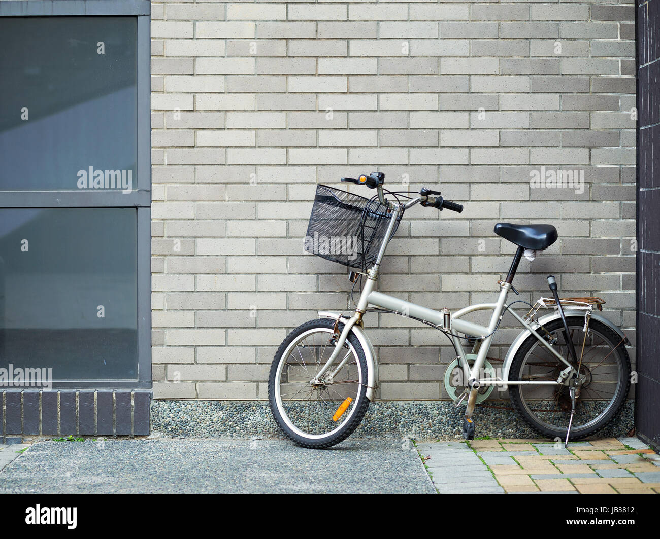 Bicycle and brick wall Stock Photo - Alamy