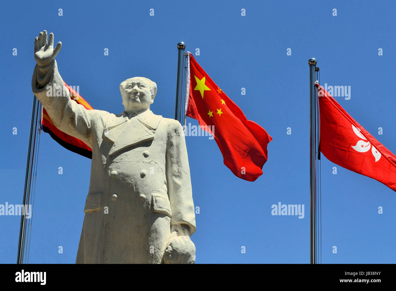 A Statue of China's former Chairman Mao Zedong with Chinese flagin the ...