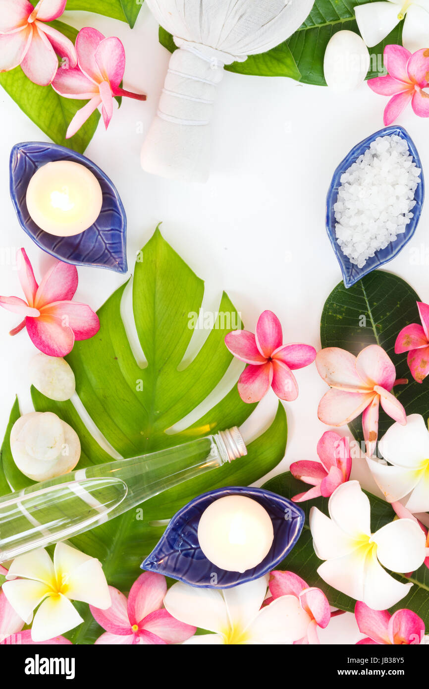 Spa botanical tropical concept herb salt coconut oil and plumeria ...