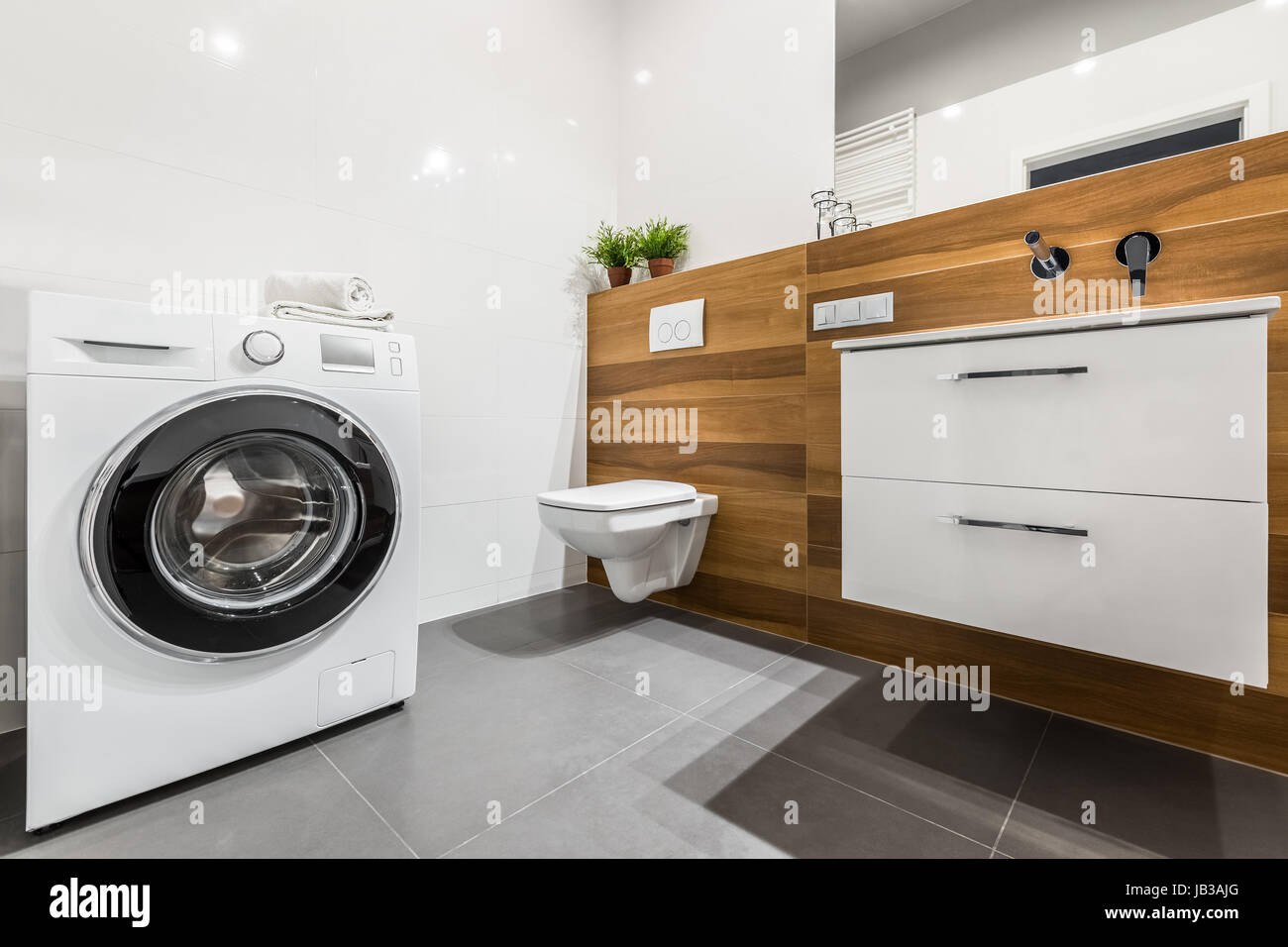 Space washing machine wooden cabinet hi-res stock photography and ...