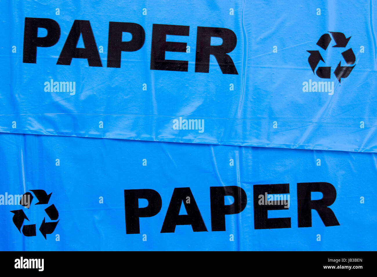 Background of yellow garbage bags for recyclable paper Stock Photo - Alamy
