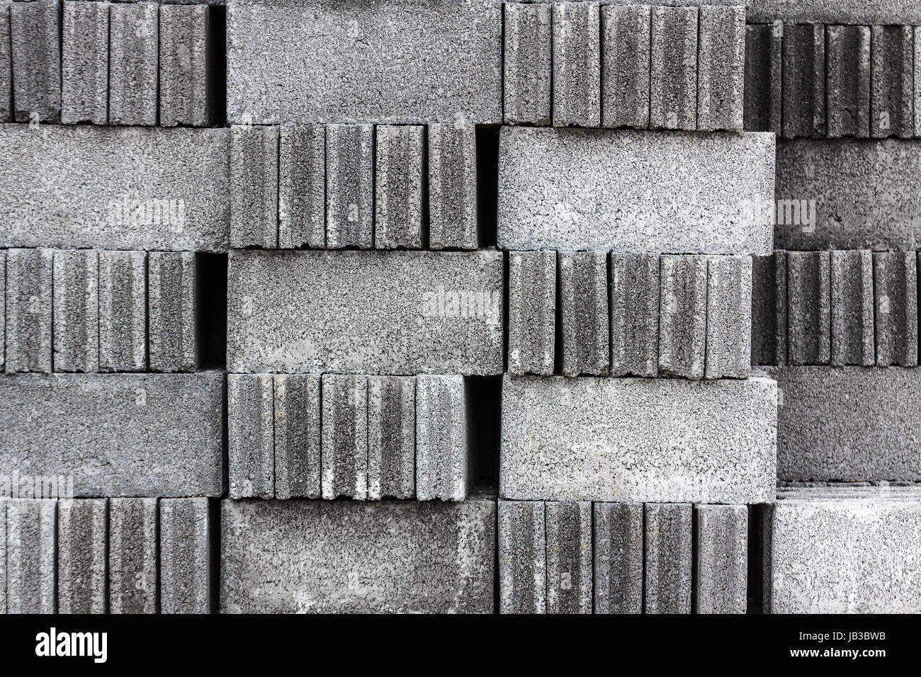 Stack of cement blocks at the construction site Stock Photo - Alamy