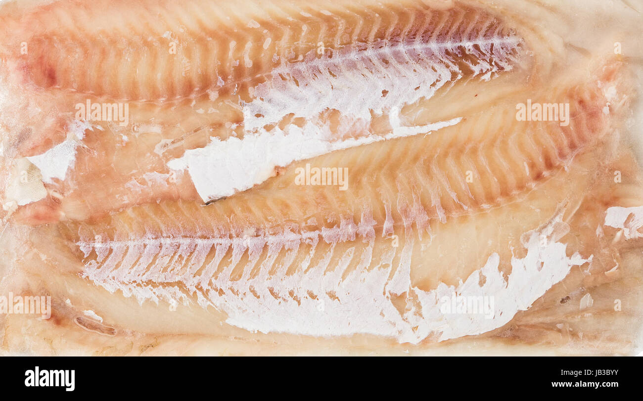 frozen carcass fish in brick for trade, background Stock Photo - Alamy