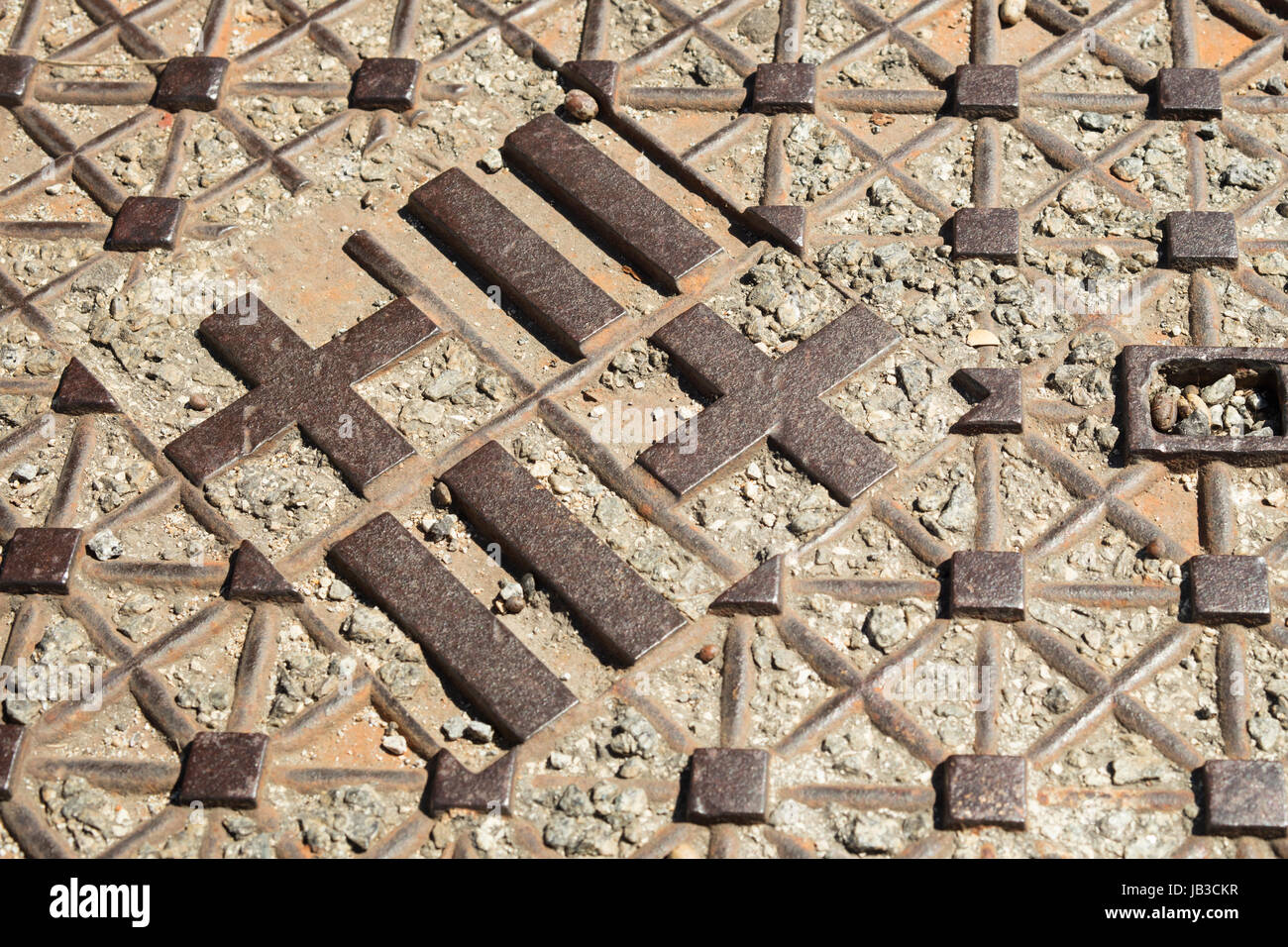 Manhole cover with coat of arms hi-res stock photography and images - Alamy