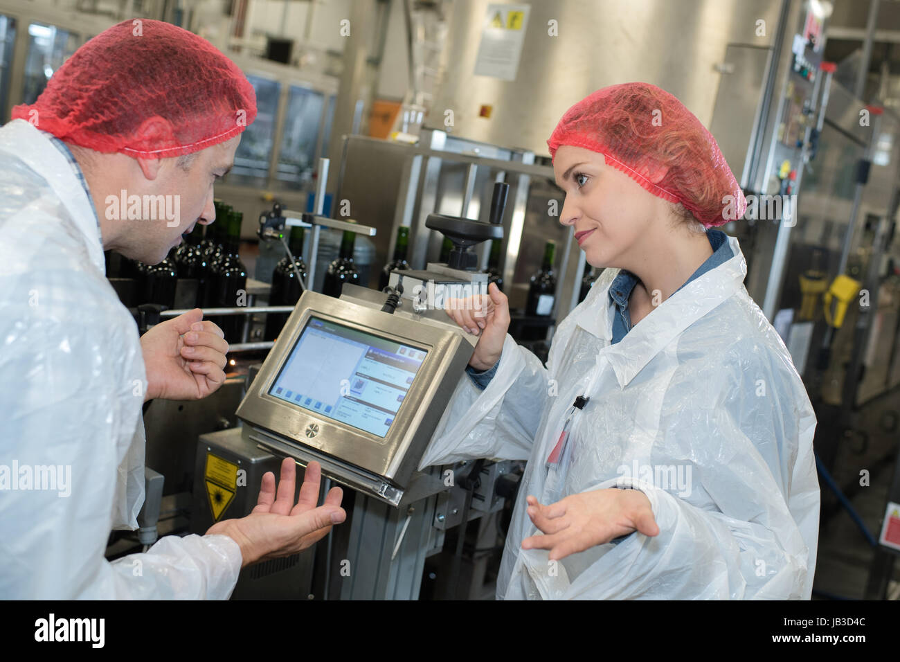 workers on food production line Stock Photo - Alamy
