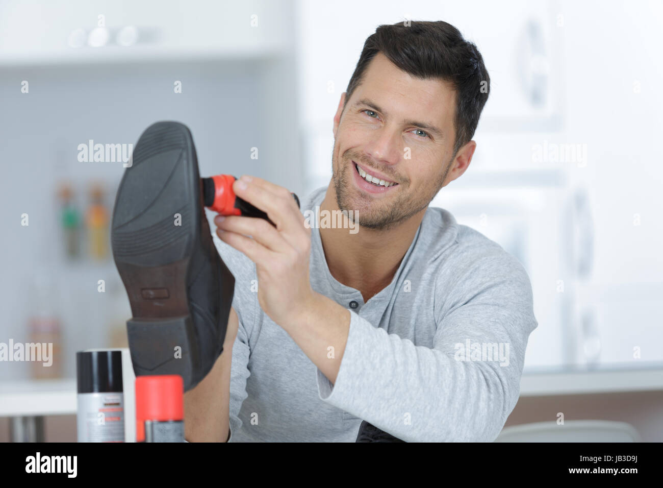 man polish his own shoes Stock Photo - Alamy