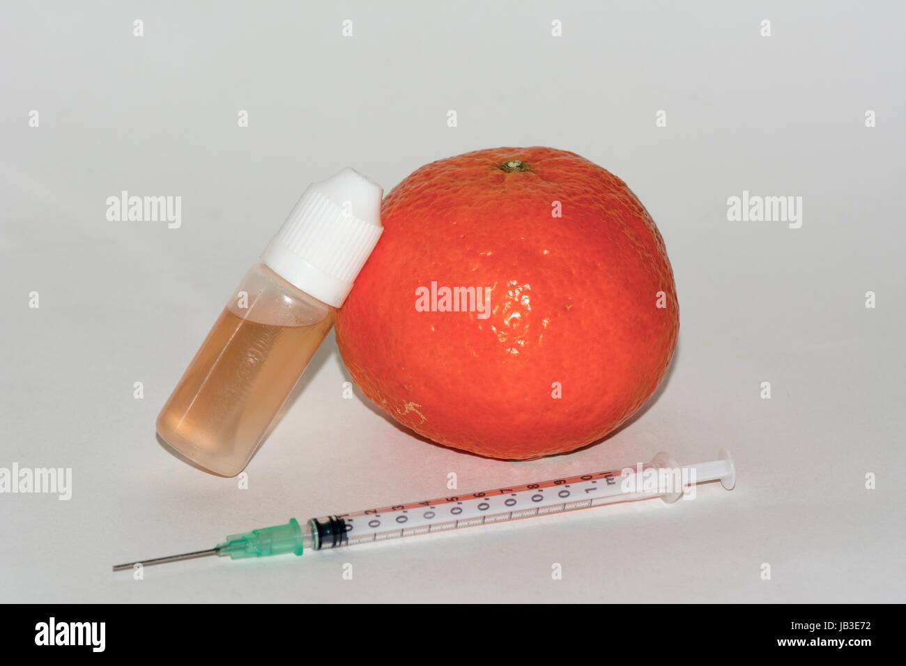 liquid with a tangerine Stock Photo - Alamy