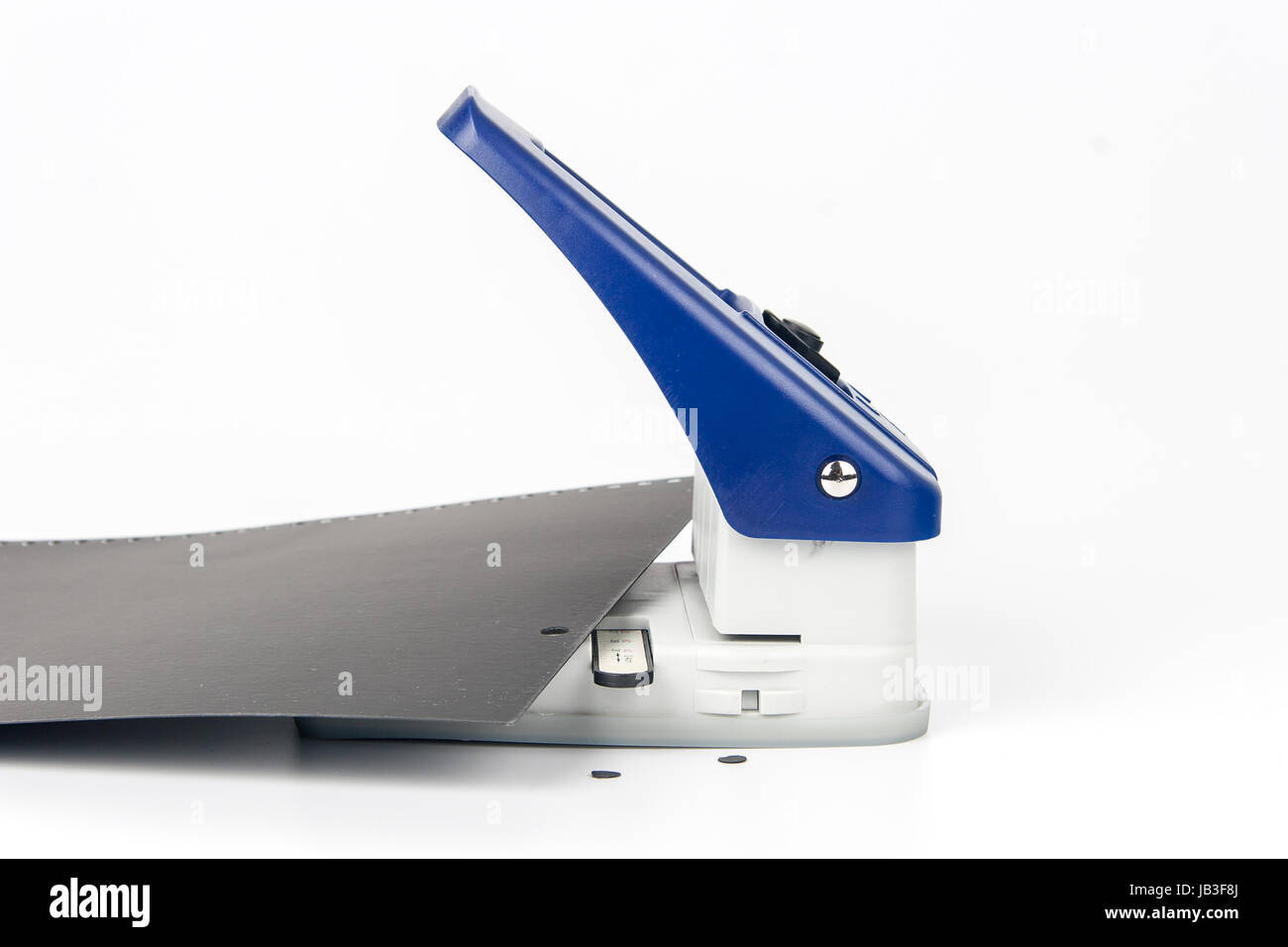 Office Puncher Unit isolated on white background Stock Photo - Alamy