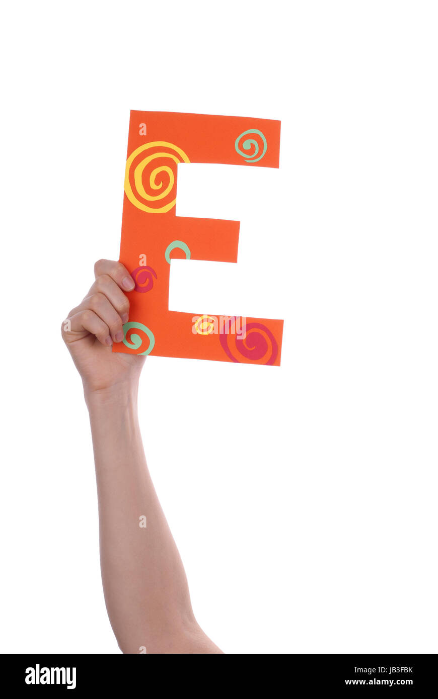 A Hand Holding a Colorful E, Isolated Stock Photo - Alamy