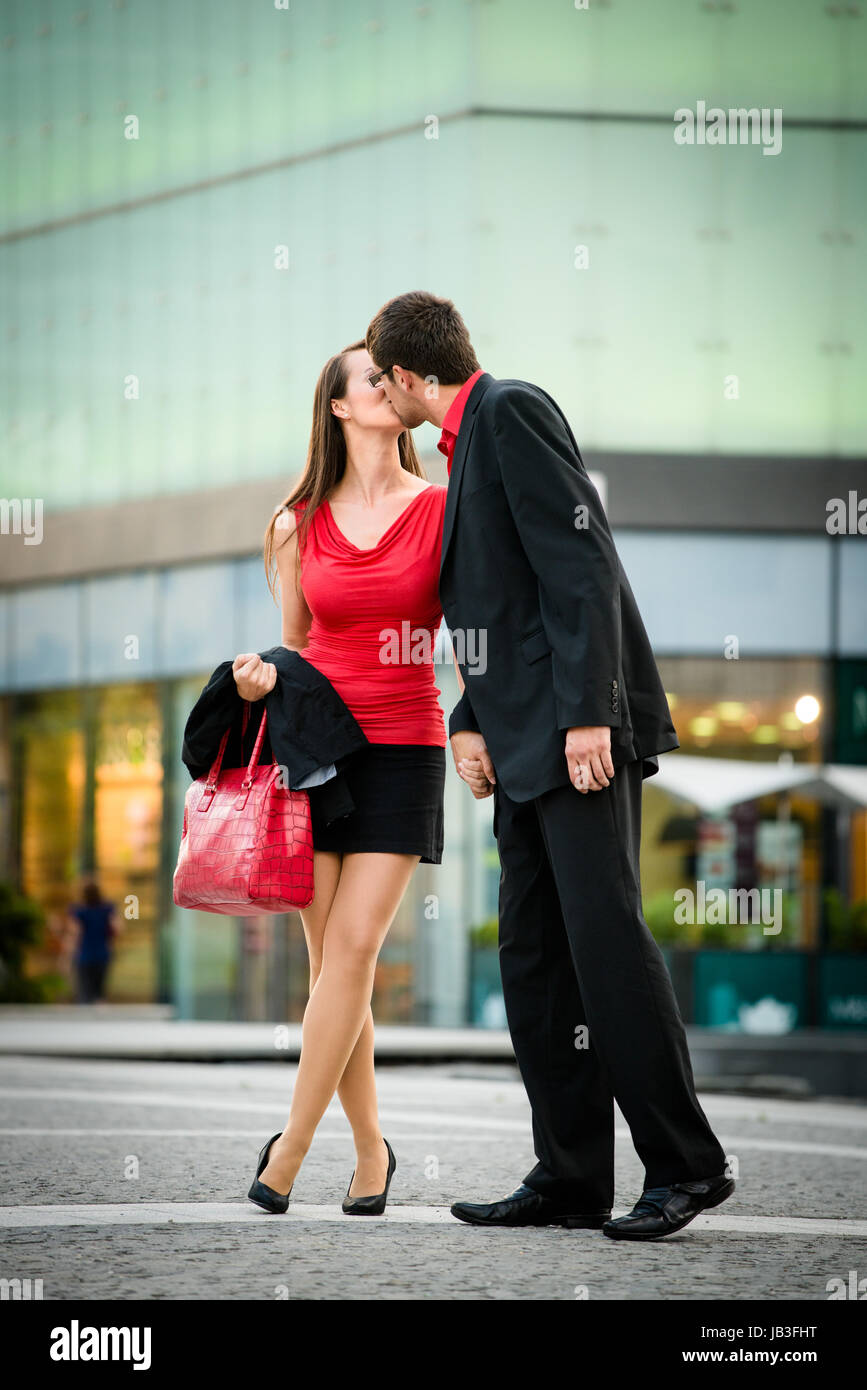Friends greeting and kiss each other hi-res stock photography and ...