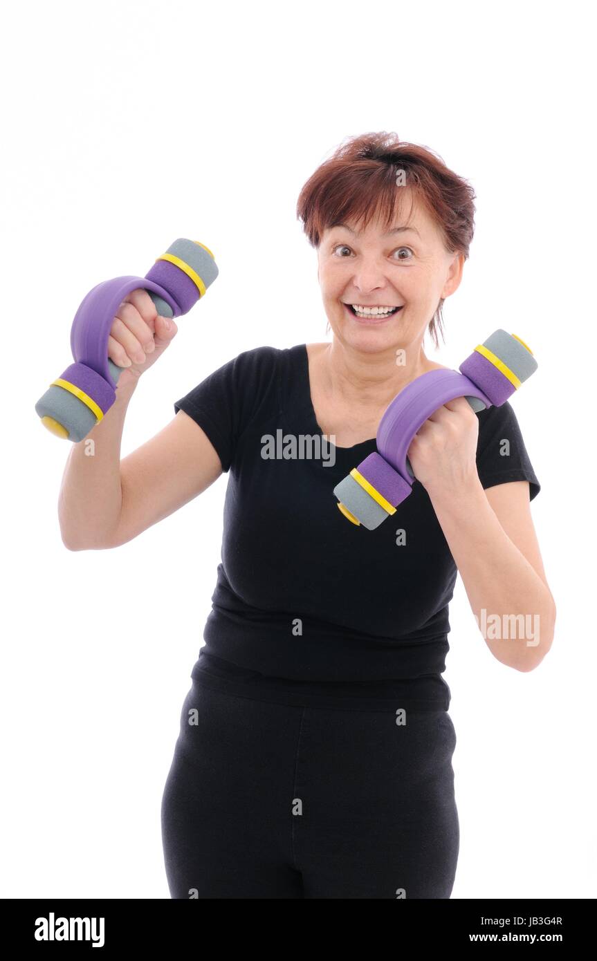 Smiling senior fitness woman with barbells Stock Photo - Alamy