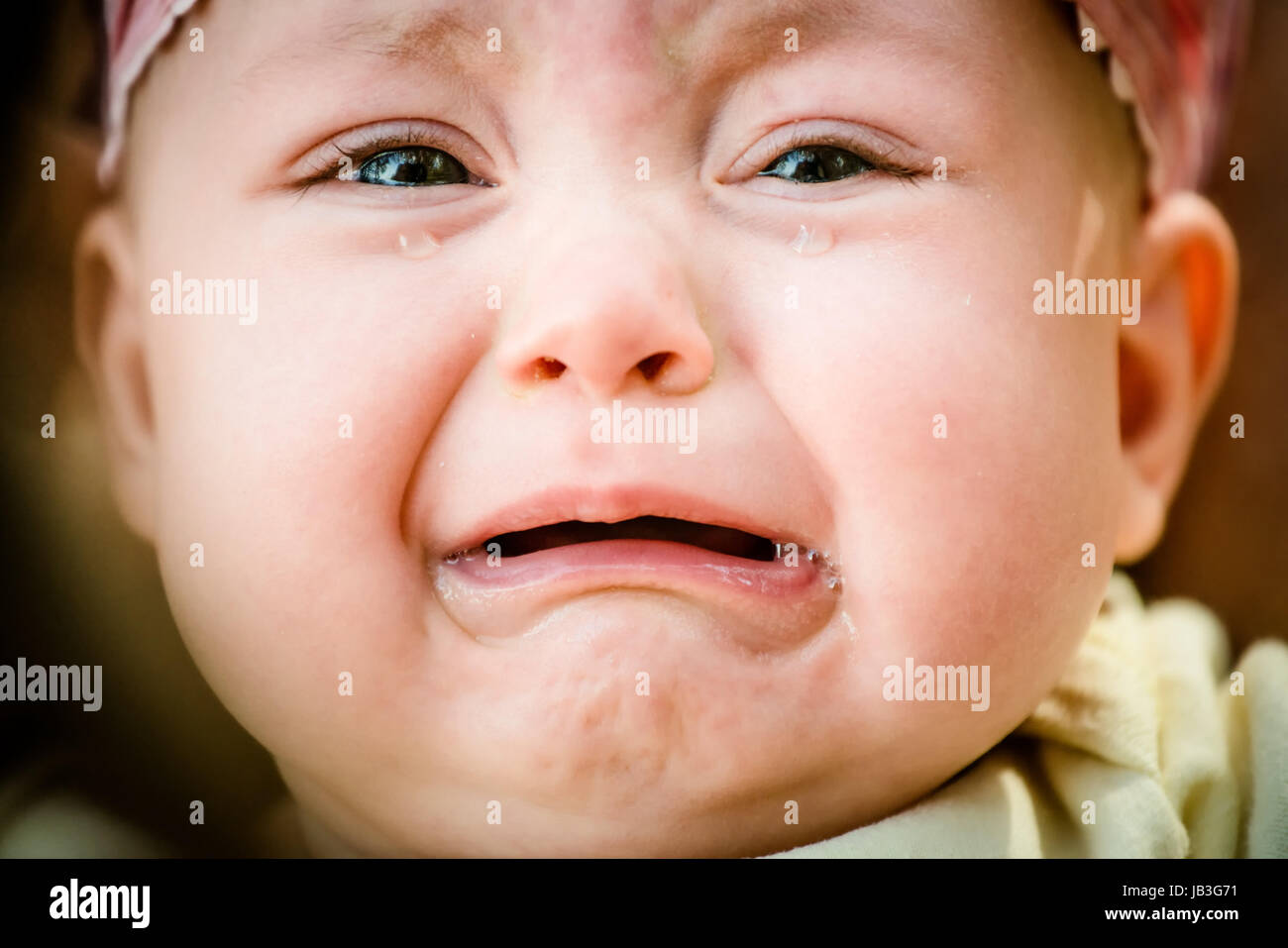 Baby crying - pure authentic emotion, tears visible Stock Photo - Alamy