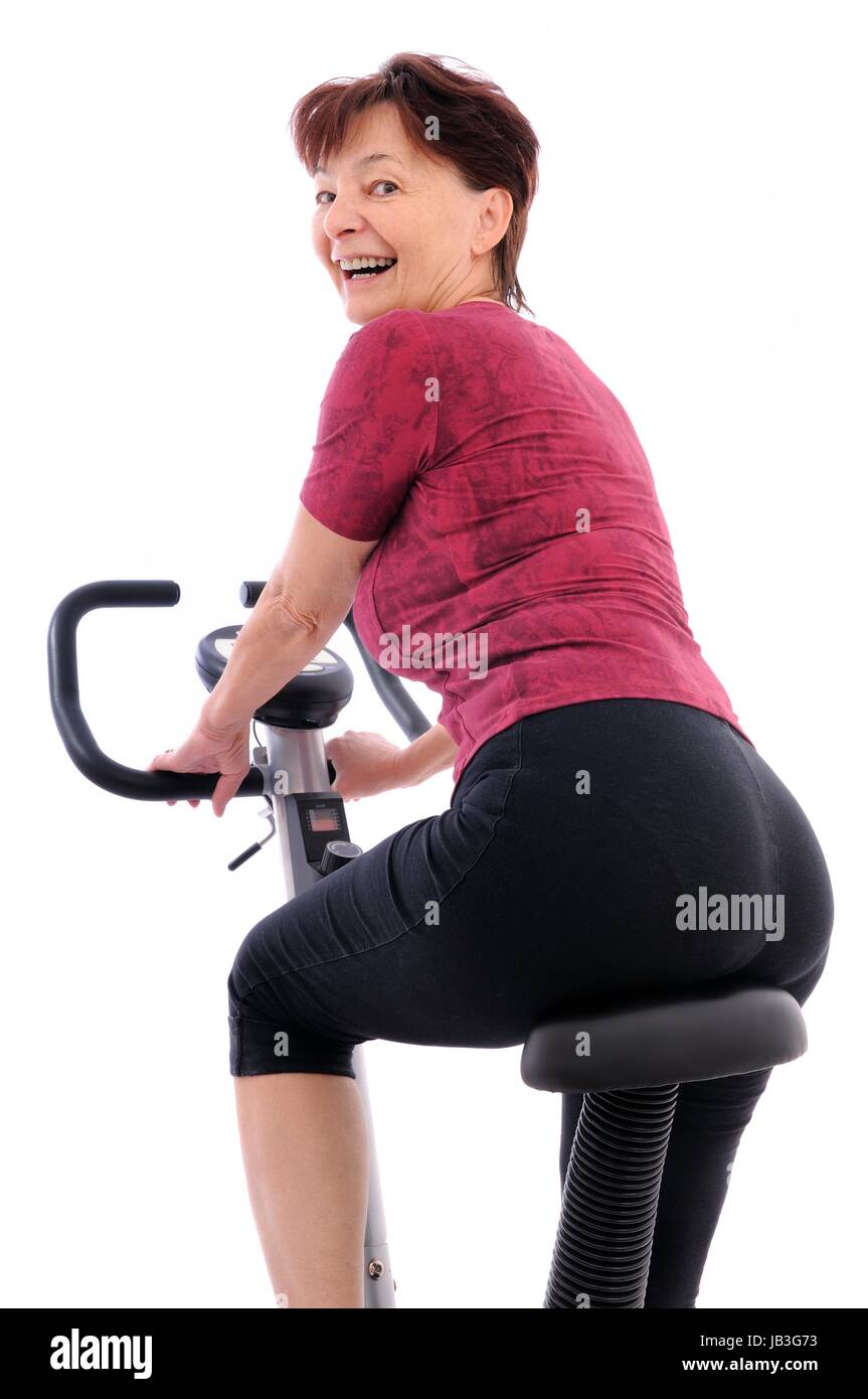 Spinning senior woman - back view Stock Photo - Alamy