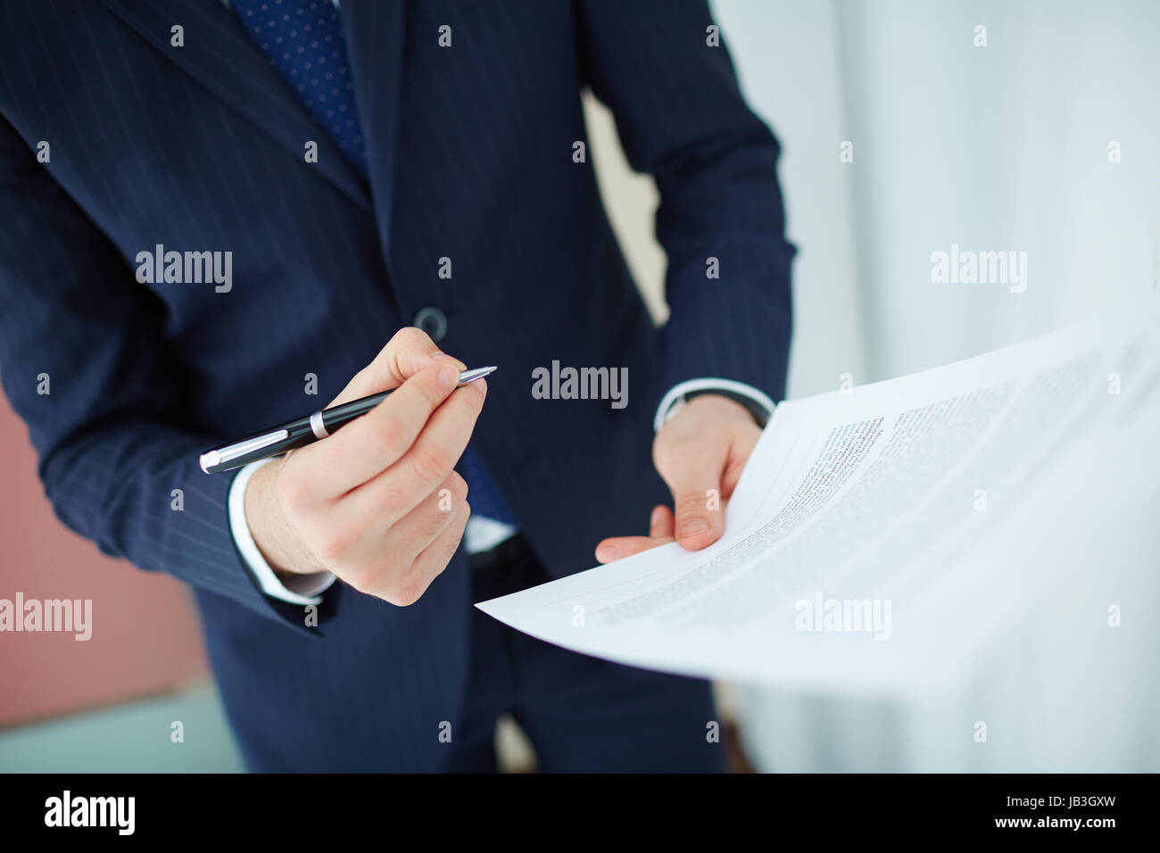 Image of human hand with pen and contract Stock Photo - Alamy