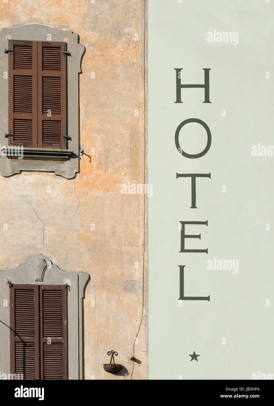 Hotel sign painted on wall Stock Photo - Alamy