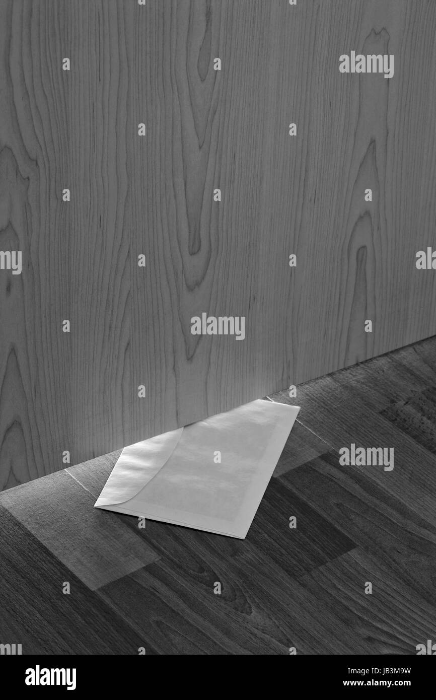 Envelope slipped under door hi-res stock photography and images - Alamy