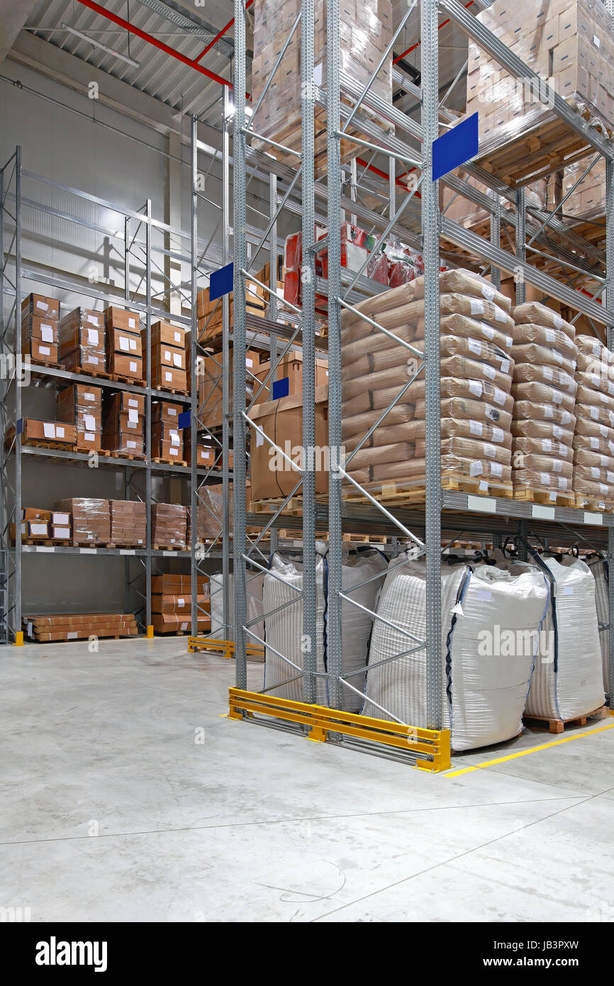 Food distribution warehouse with high shelves Stock Photo - Alamy