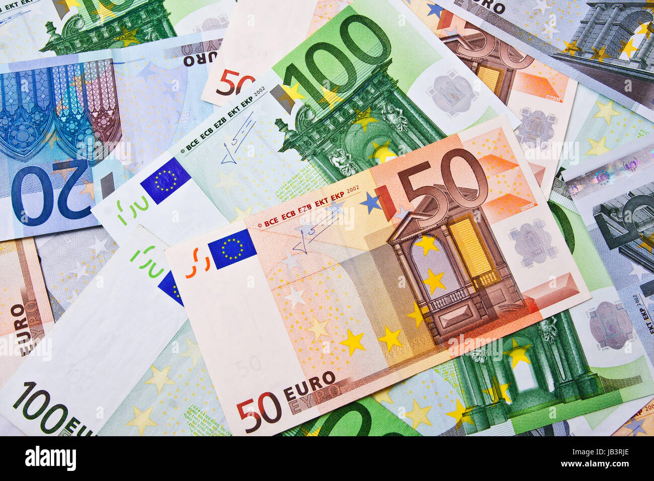 Many euro banknotes making european currency background Stock Photo - Alamy