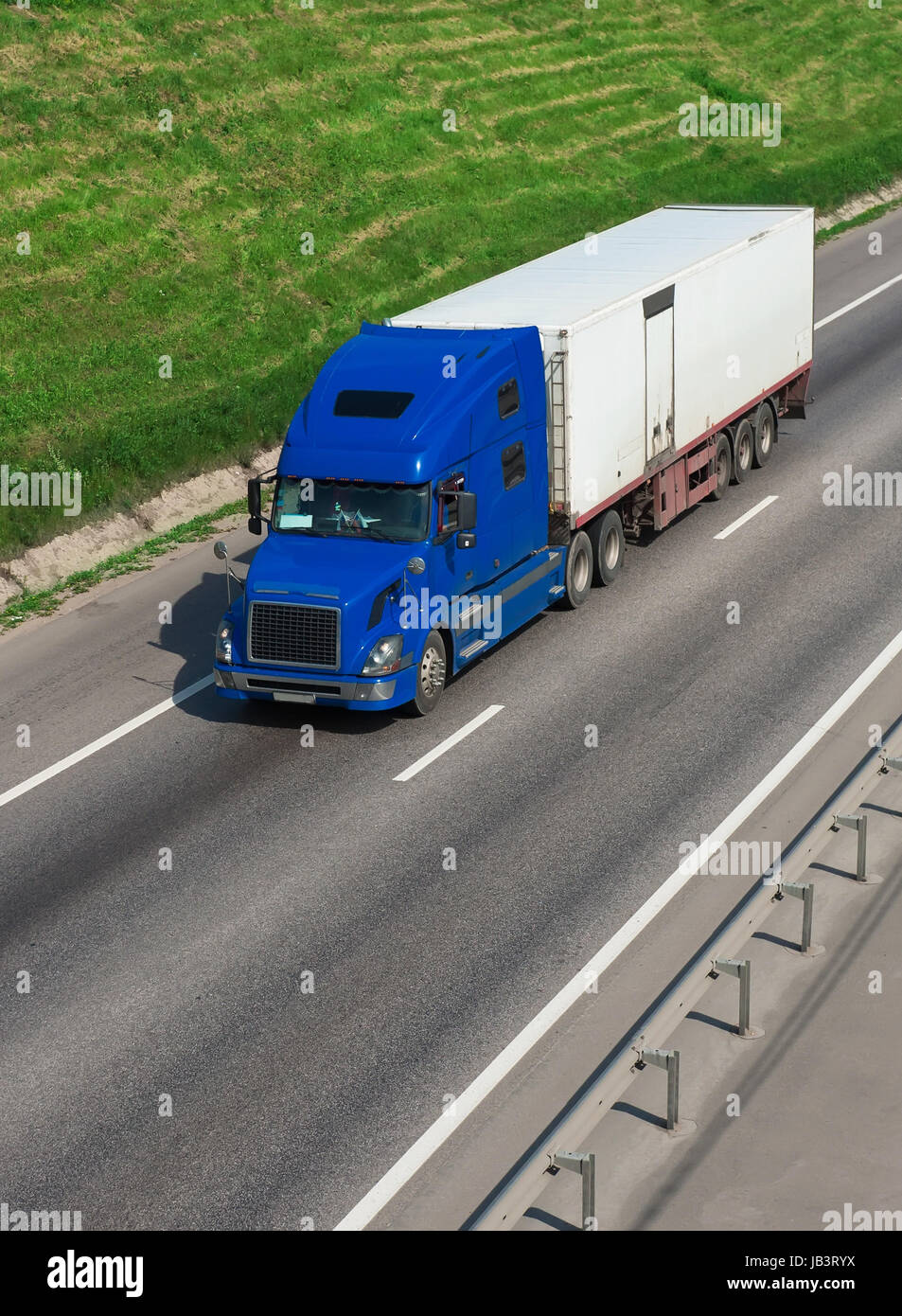 Beautiful photo of big truck on highway Stock Photo - Alamy