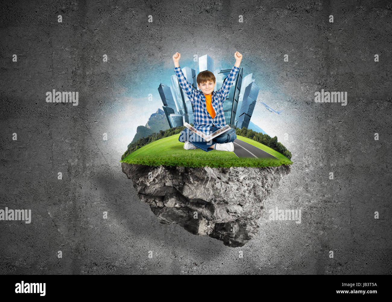 Cute boy of school age with book exploring this great world Stock Photo ...