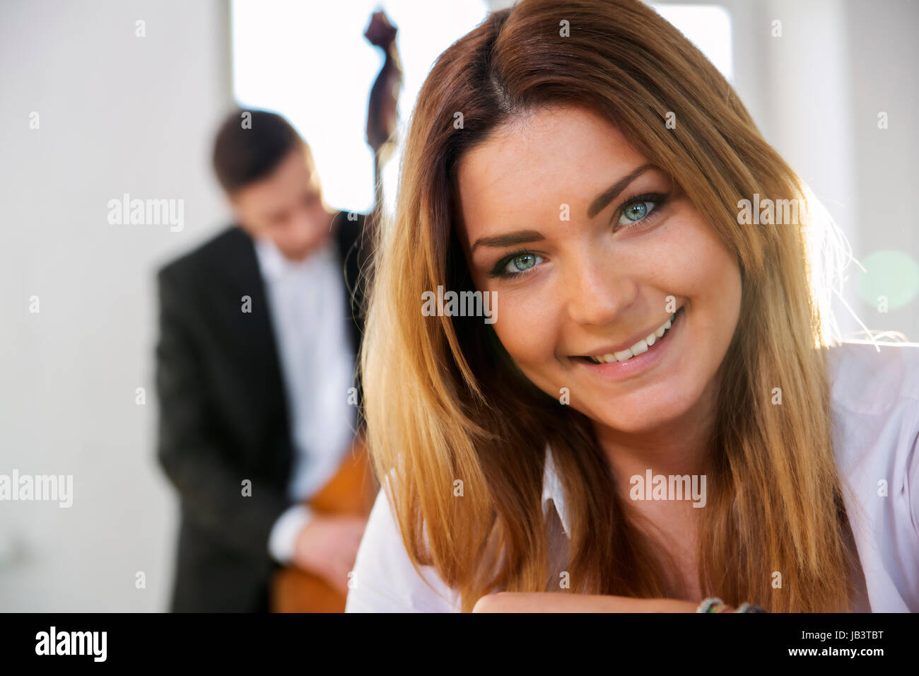 Zoomed face of young woman smile on camera Stock Photo - Alamy