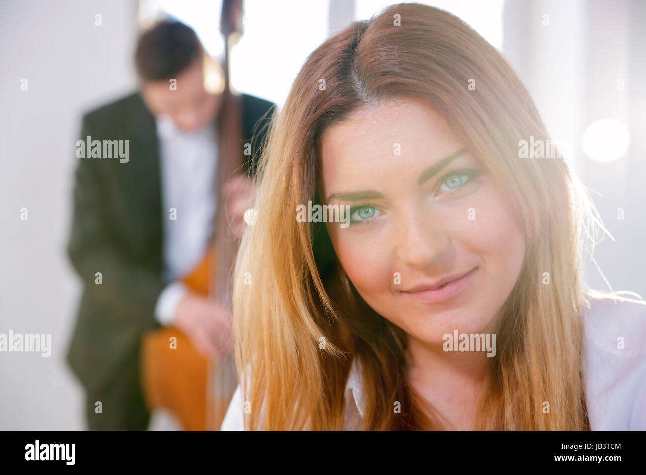 Zoomed face of smiling young woman on sunlight Stock Photo - Alamy
