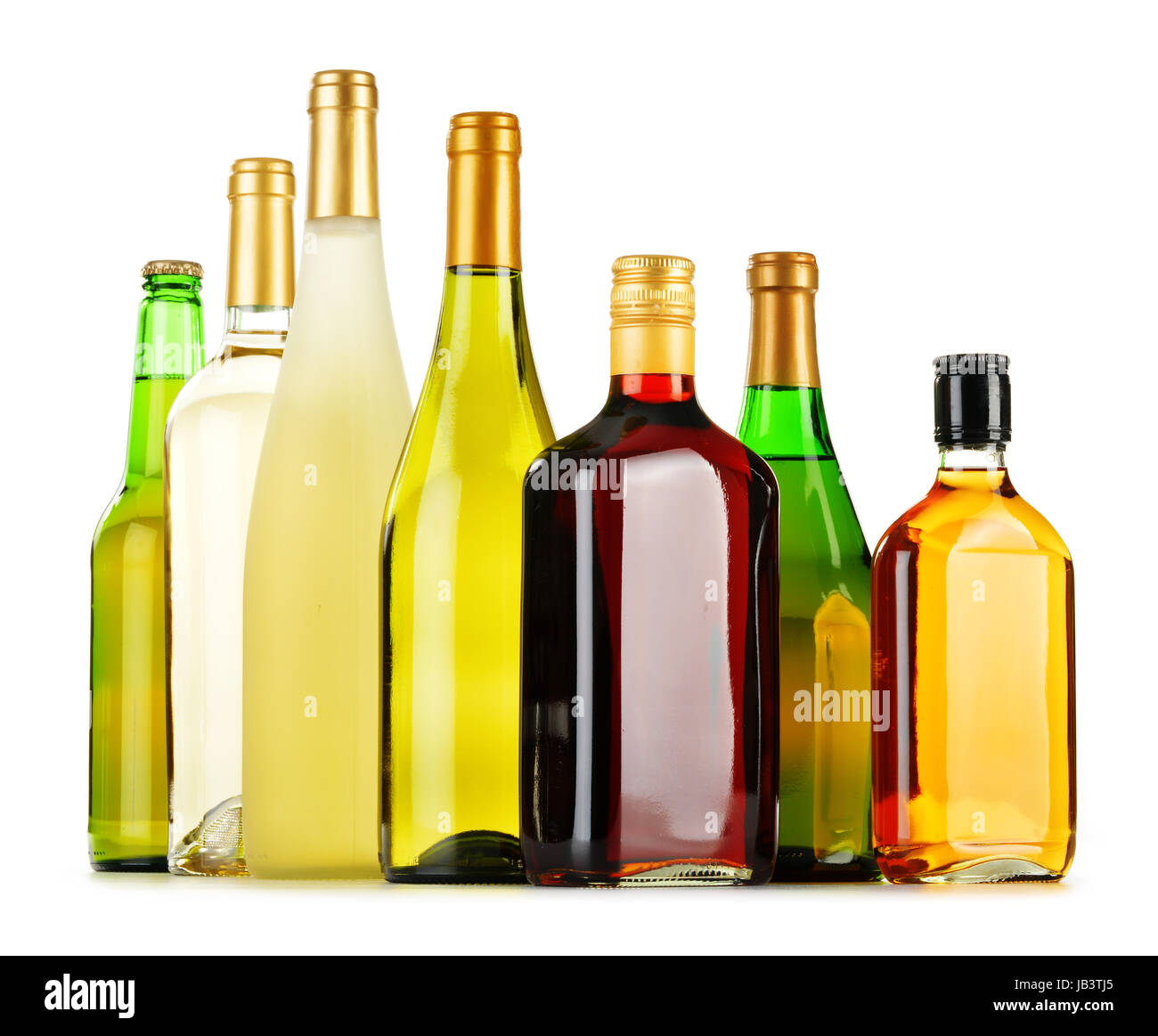 Bottles of assorted alcoholic beverages isolated on white background ...