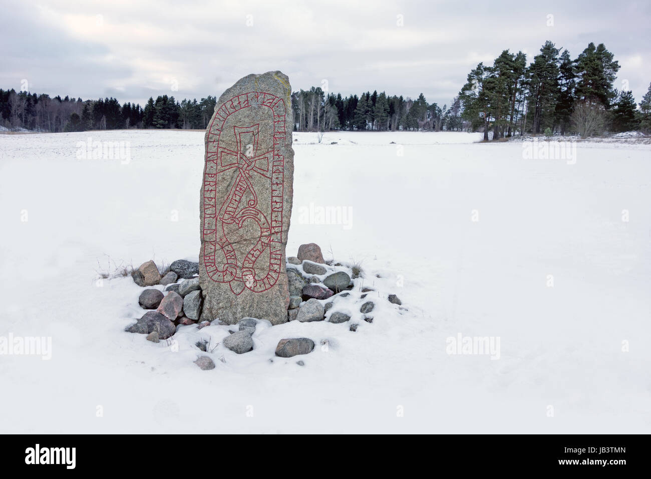 A runestone on a open field in eastern Sweden Stock Photo - Alamy