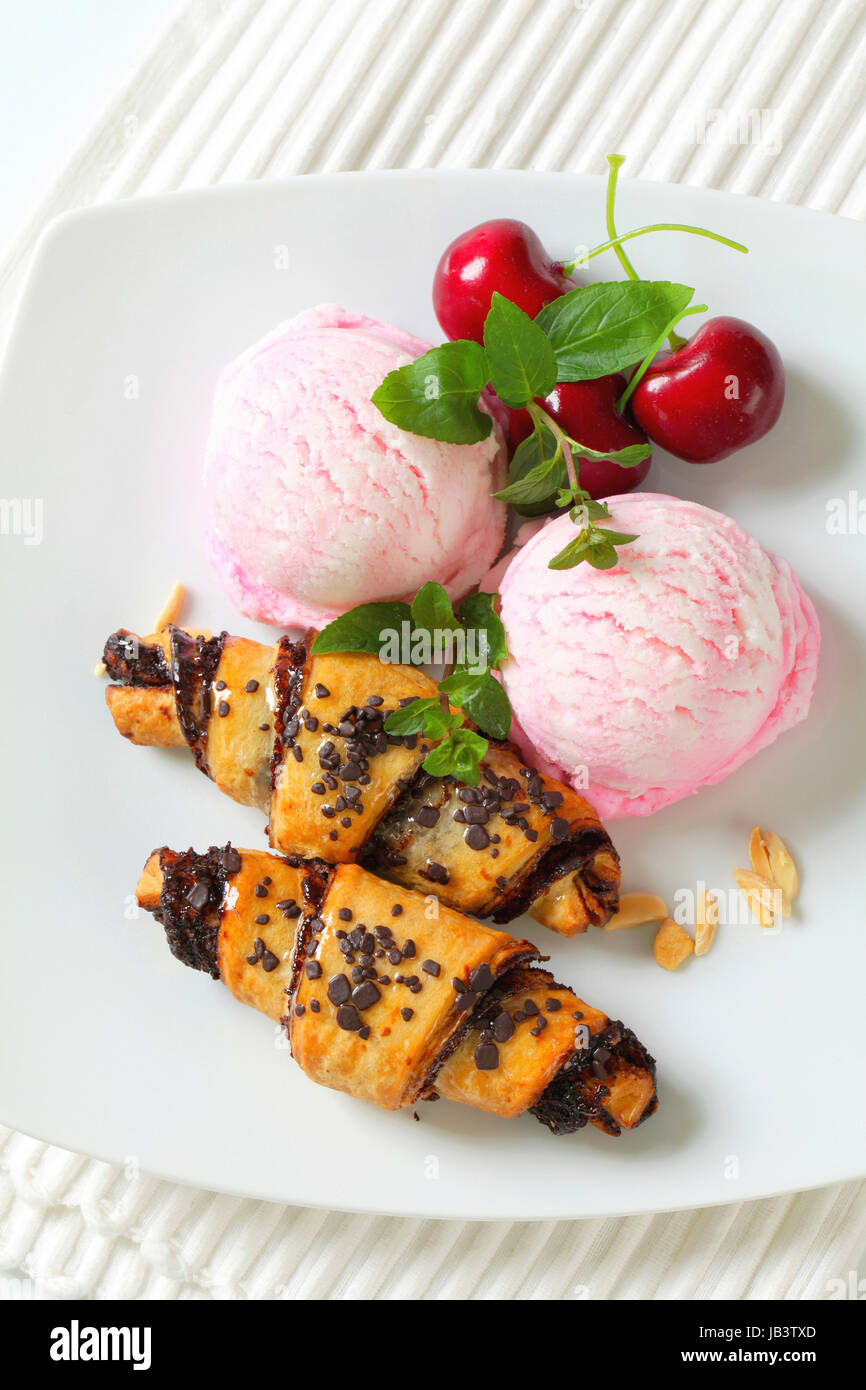 Chocolate chip crescent rolls with two scoops of ice cream Stock Photo ...