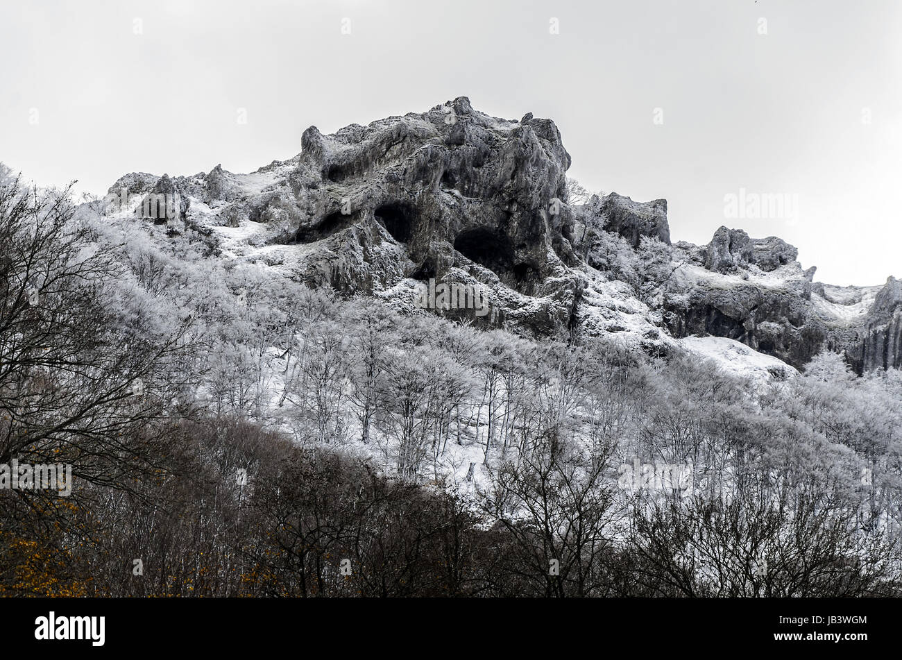 Beautiful winter picture at the rocks on the mountain. They are covered ...