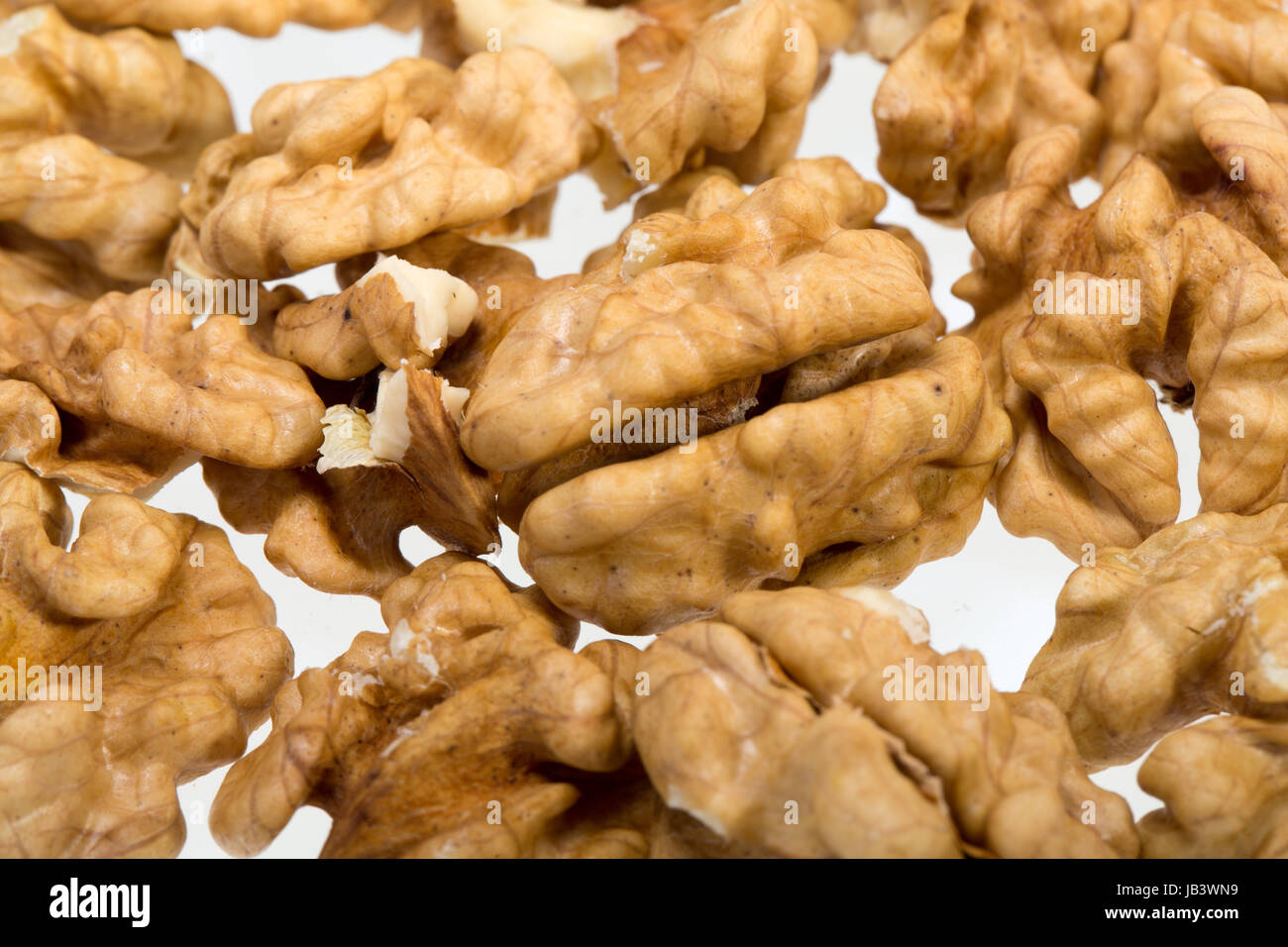 cracked walnut isolated on the white background Stock Photo - Alamy