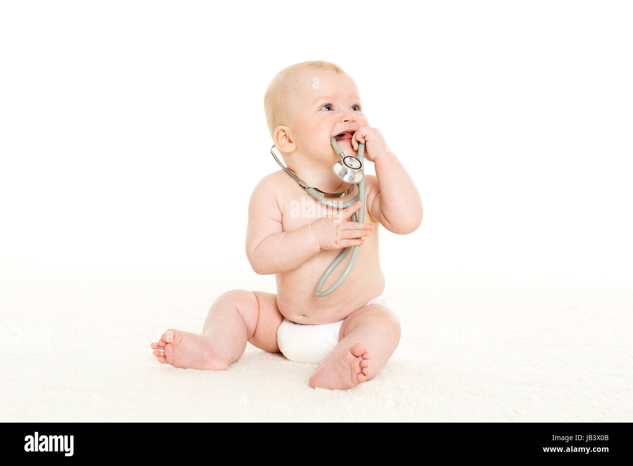 Sweet baby with stethoscope on a white background Stock Photo - Alamy