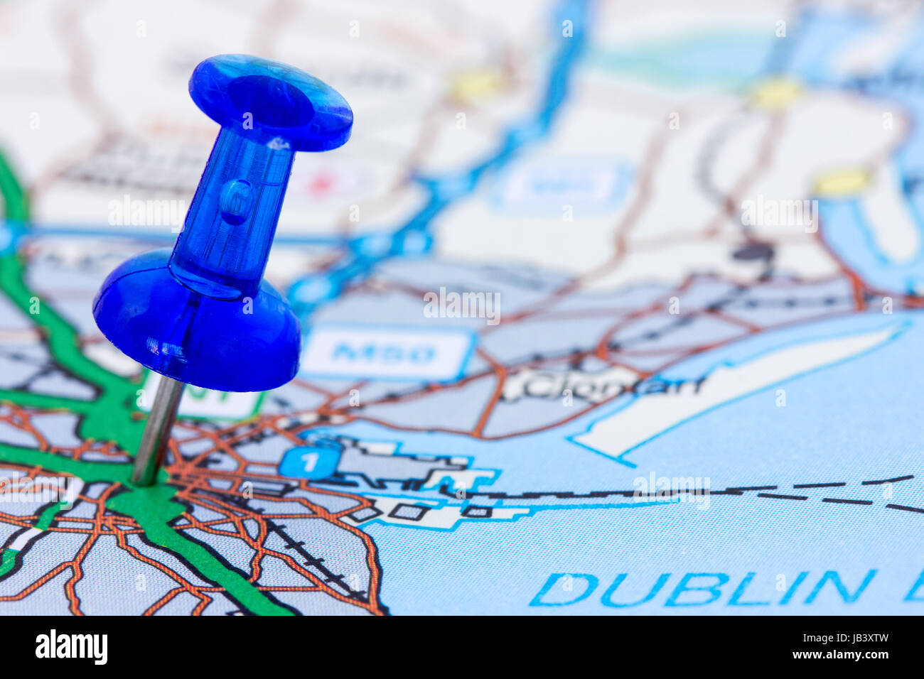 Closeup of blue pushpin on the map Stock Photo - Alamy