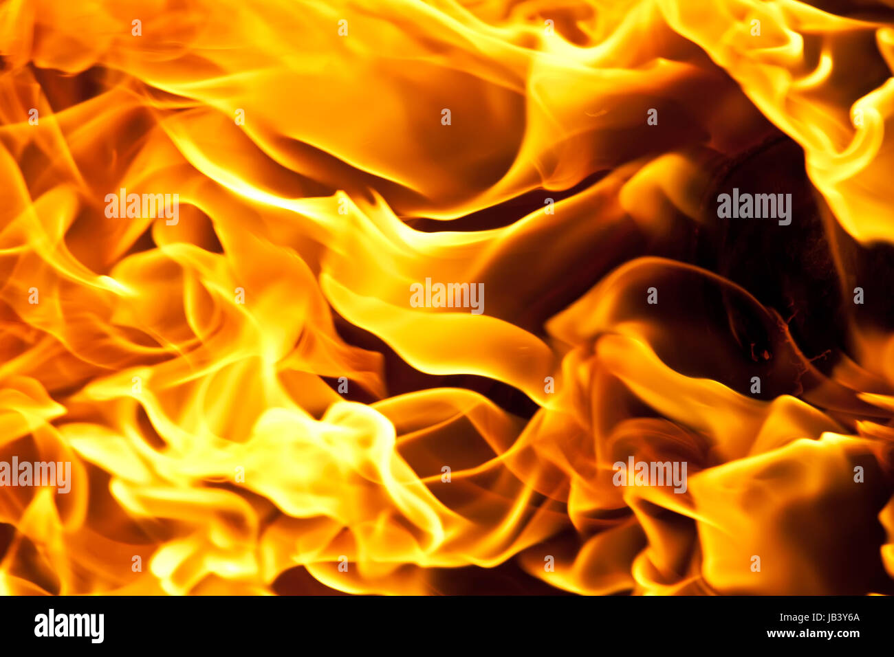 Beautiful yellow and orange hot fire on black background Stock Photo ...