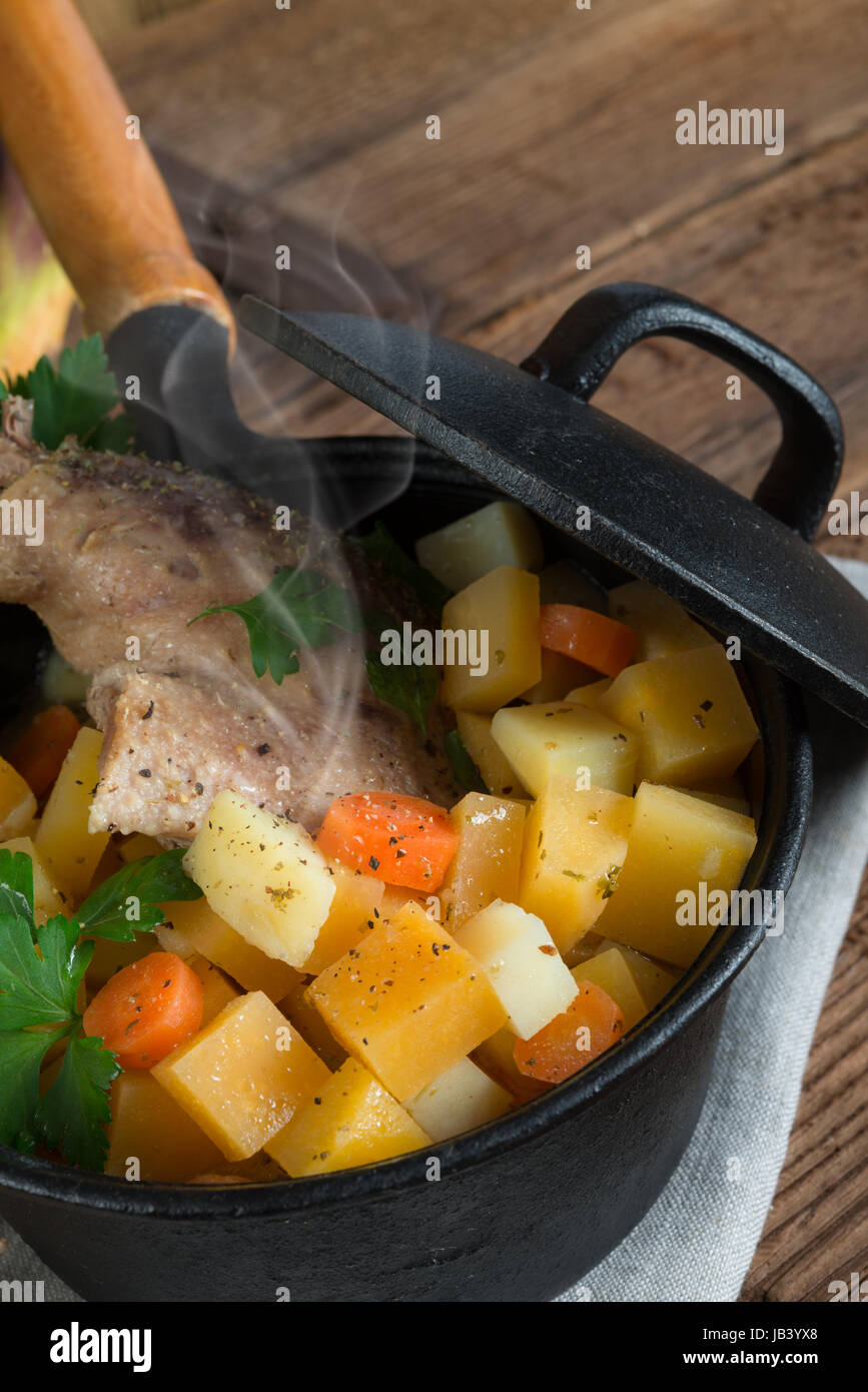 Goose - soup with red wine and thyme Stock Photo - Alamy
