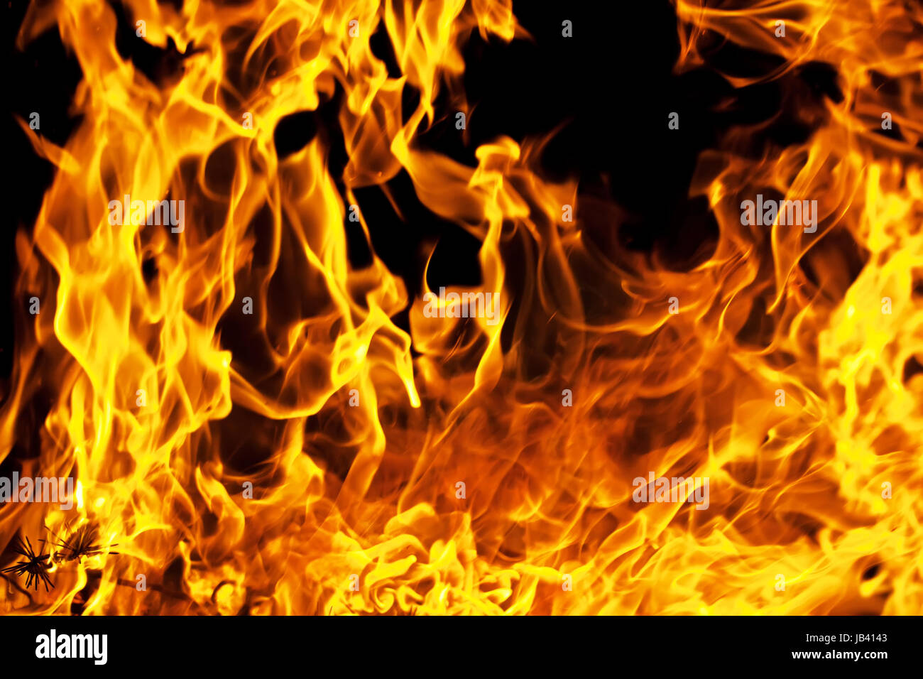 Beautiful yellow and orange hot fire on black background Stock Photo ...