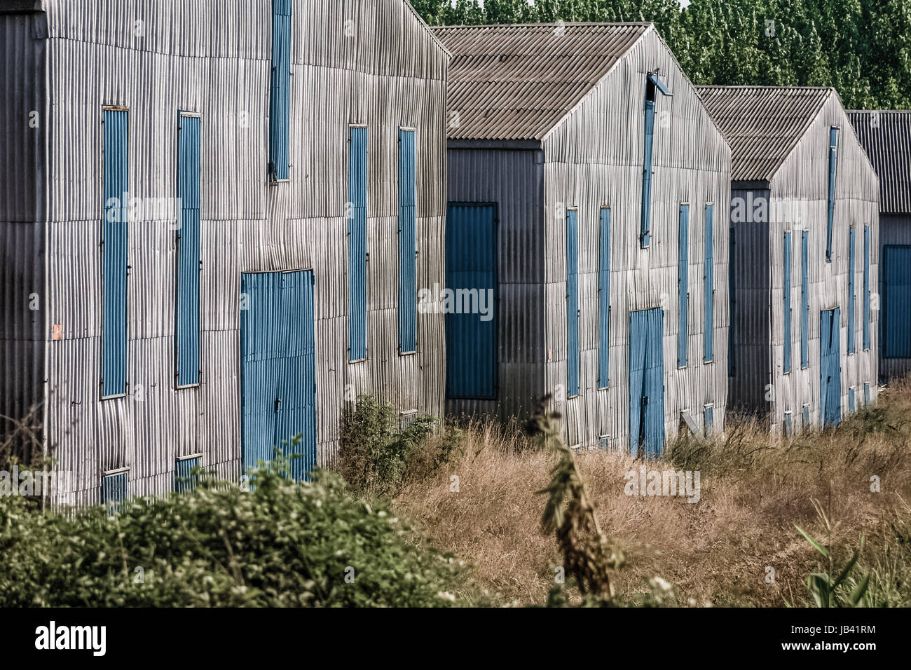 View of Farm warehouses used to store corn and hay Stock Photo - Alamy