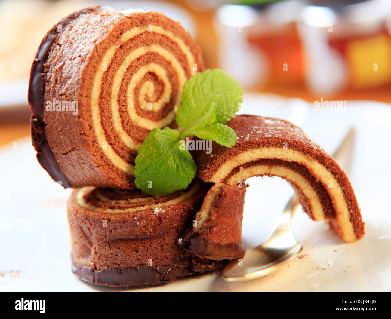 Slices of sponge cake roll - detail Stock Photo - Alamy