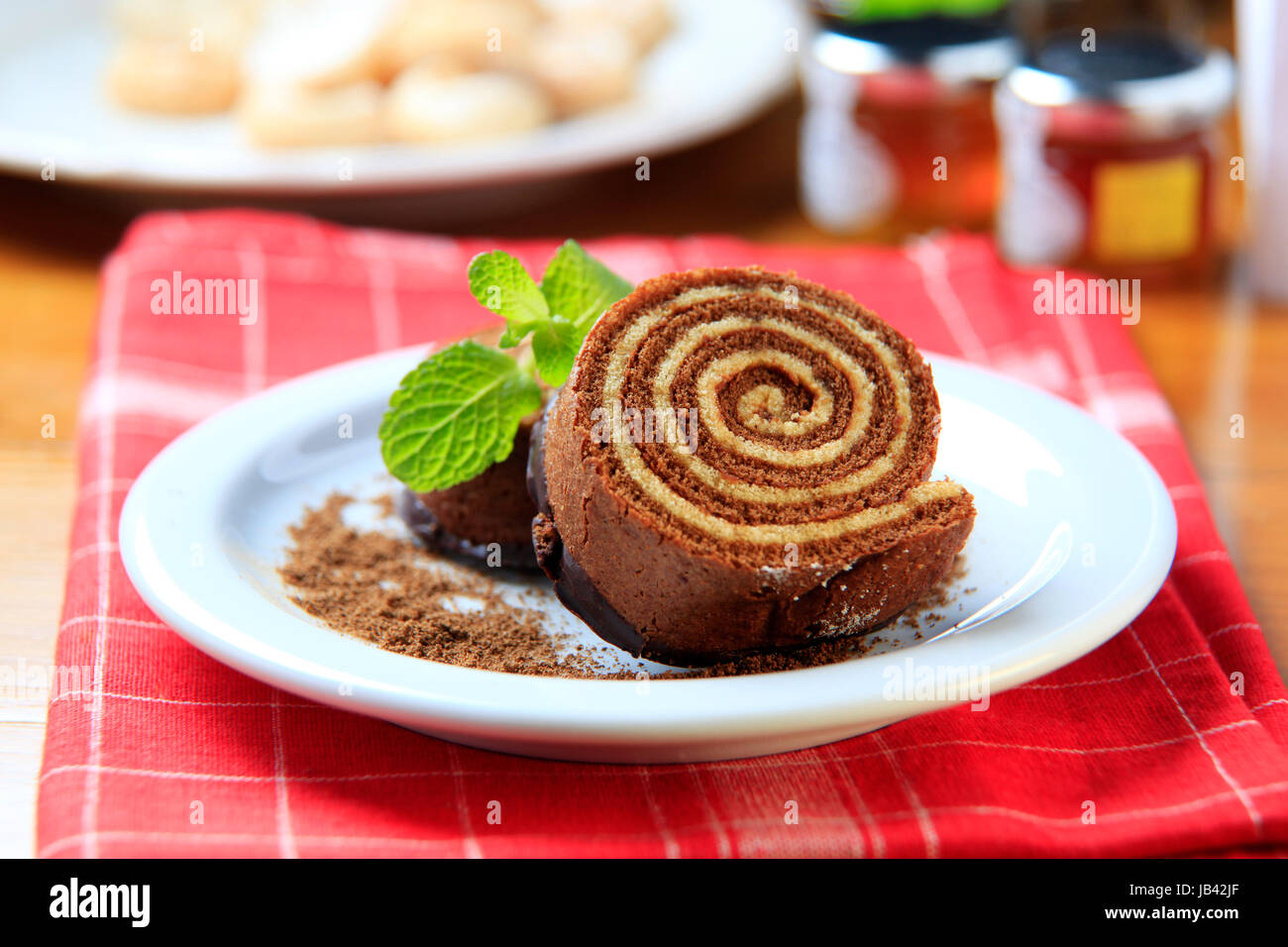 Slices of sponge cake roll - detail Stock Photo - Alamy