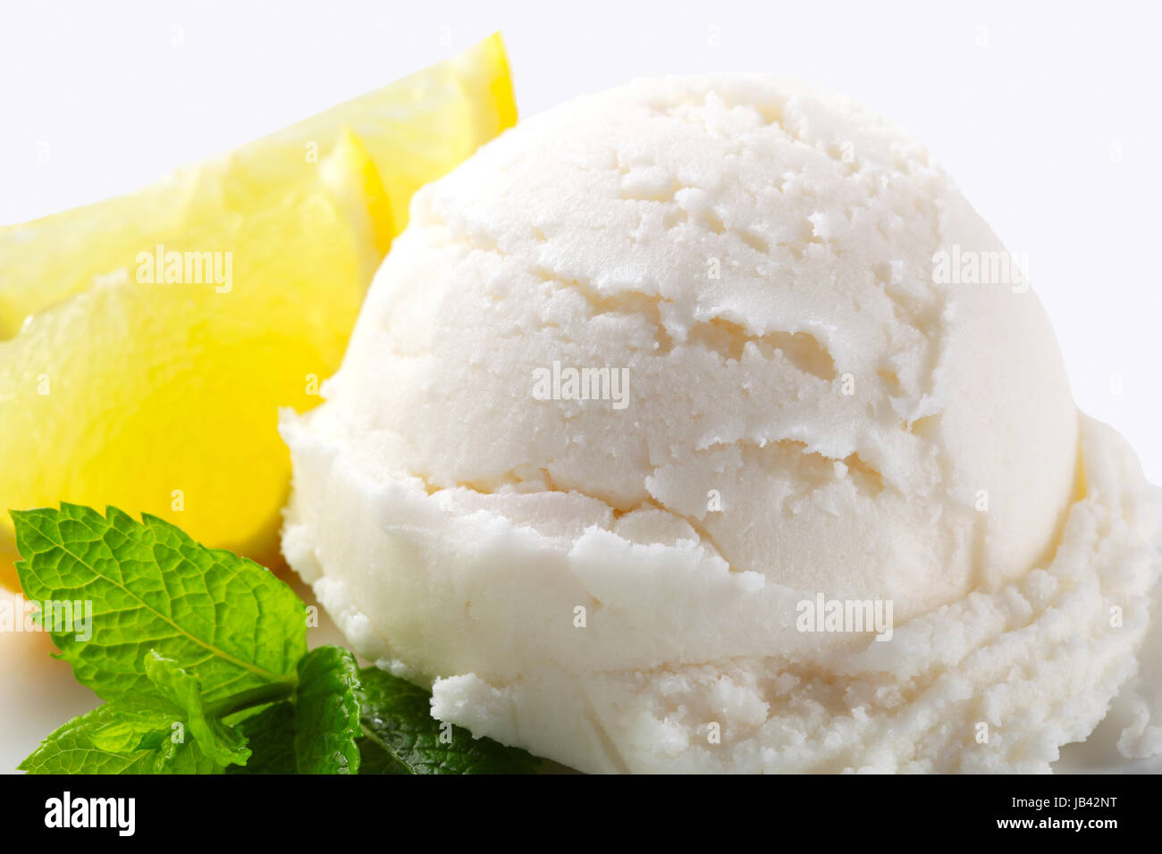 Scoop of lemon ice cream Stock Photo - Alamy